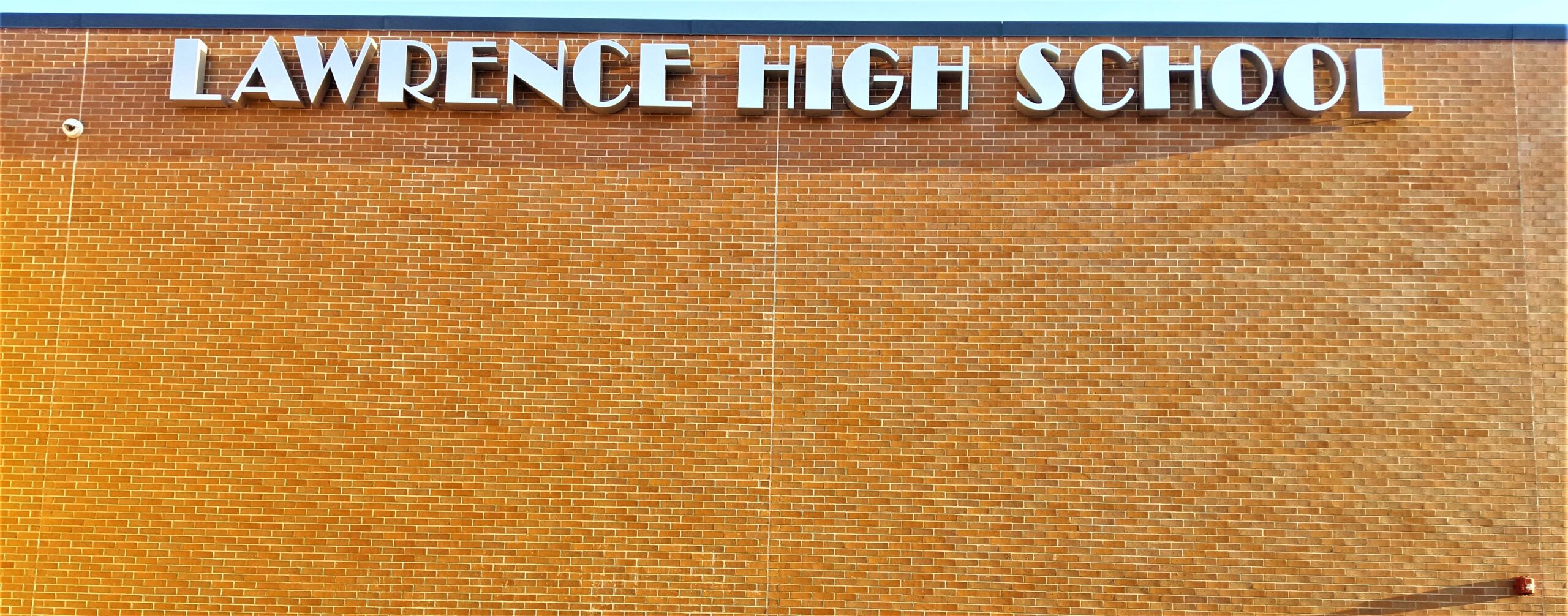 Police have increased presence at Lawrence High School following weekend homicide that involved ...